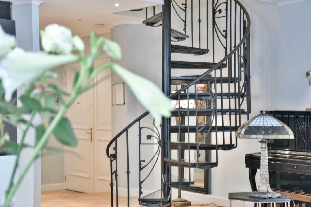 The Timeless Elegance of an Iron Spiral Staircase - artisanhaus
